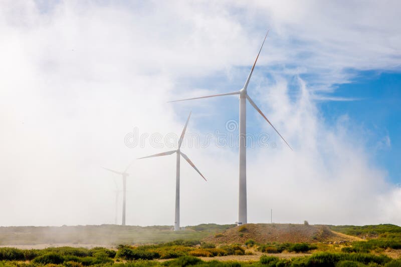 Wind Turbines, Windmill Generators Farm in a Clouds. Stock Photo ...
