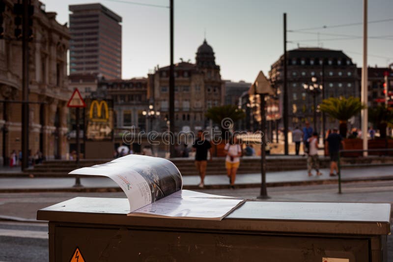 The Wind Turns the Pages of a Paper Magazine at Sunset Editorial Stock ...