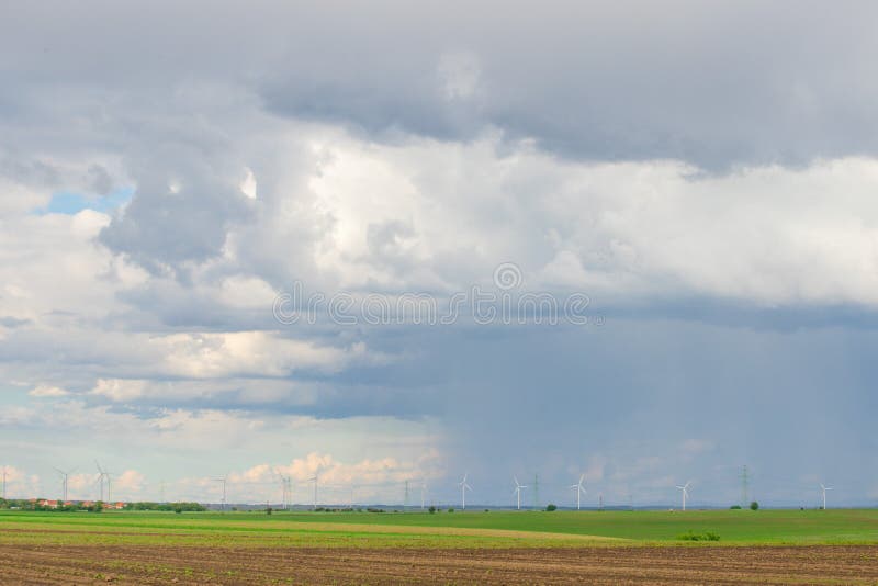 Wind Warm on Agricultural Ground with Cloudy Sky in Background Stock ...