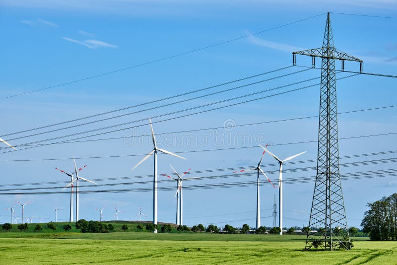 Wind Wheels and Power Lines Stock Image - Image of energy, plant: 154237751