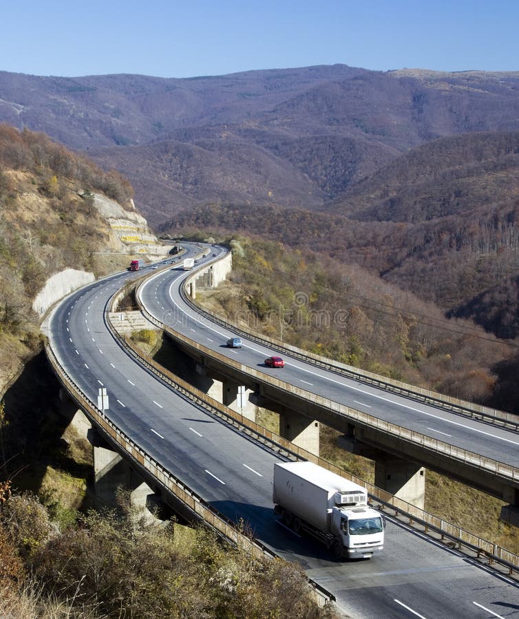 Winding highway stock image. Image of traffic, lanes - 16861343