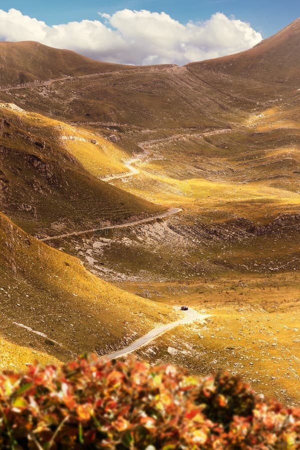 Winding Mountain Road on Rolling Terrain Stock Image - Image of cloud ...