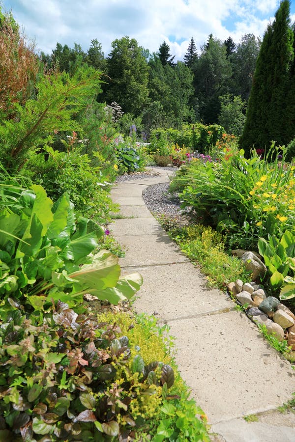 A Winding Path in the Garden Stock Image - Image of plants, curve: 97419665