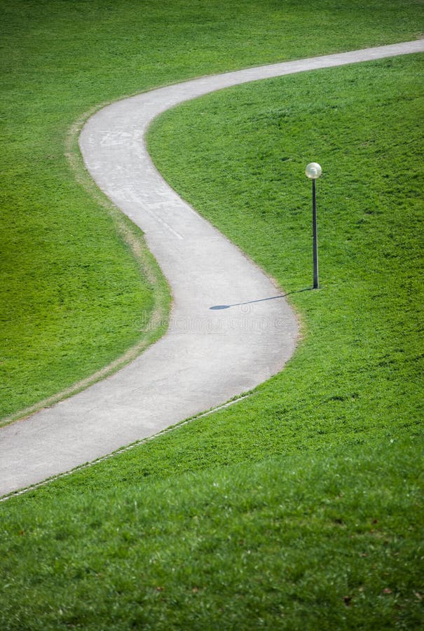 Winding Path with Street Light Stock Image - Image of road, green ...
