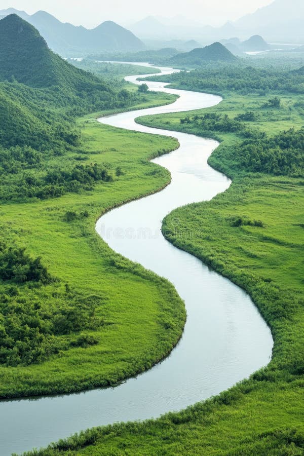 A Winding River Flows through a Vibrant Tropical Landscape with Lush ...
