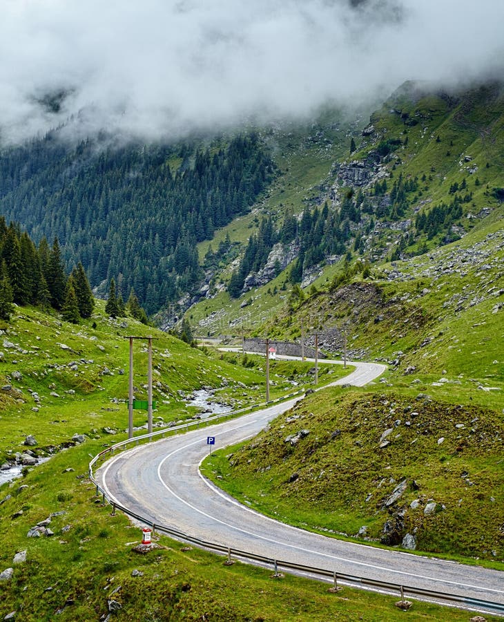 Winding road in mountains stock image. Image of route - 41957219