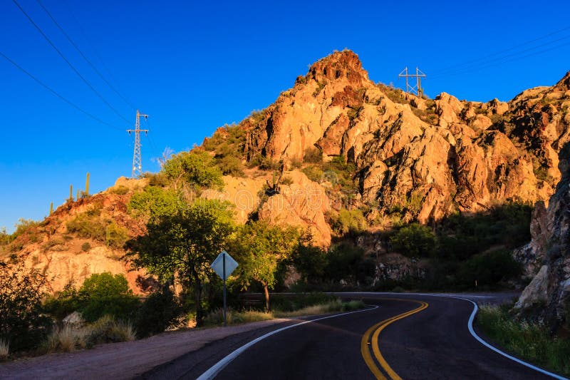 A Winding Road with a Yellow Line Down the Middle Stock Photo - Image ...