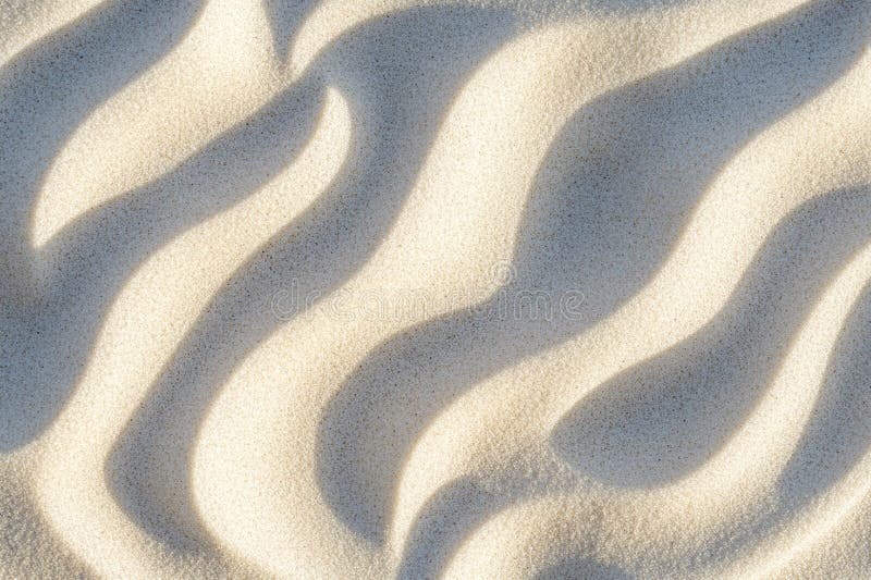 Winding Sand Patterns with Shadows Under Soft Sunlight Stock Photo ...