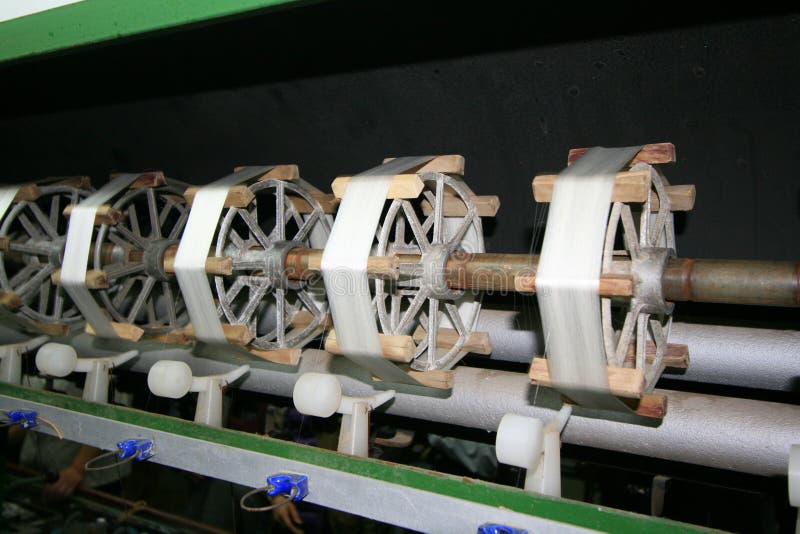 Winding Threads on a Bobbin on Sewing Machine. Stock Photo - Image of ...