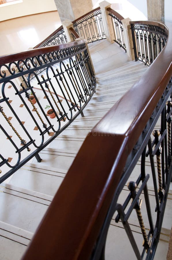 Winding Staircase with Forged Rail Stock Photo - Image of interior ...