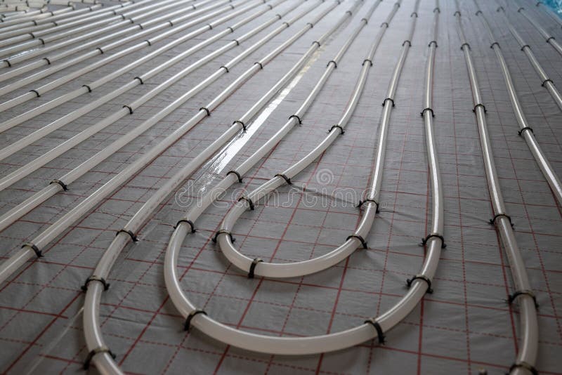 Winding Tubes of the Hydronic Radiant Heating System on the Floor Stock ...