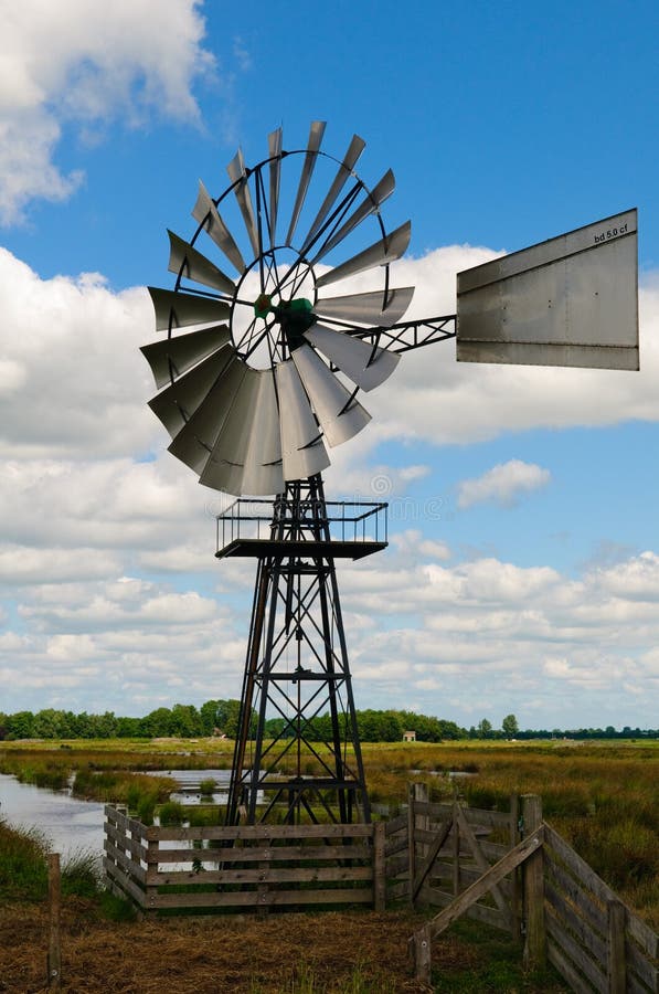 Old Rusty Barn and Windmill Stock Photo - Image of history, rustic ...