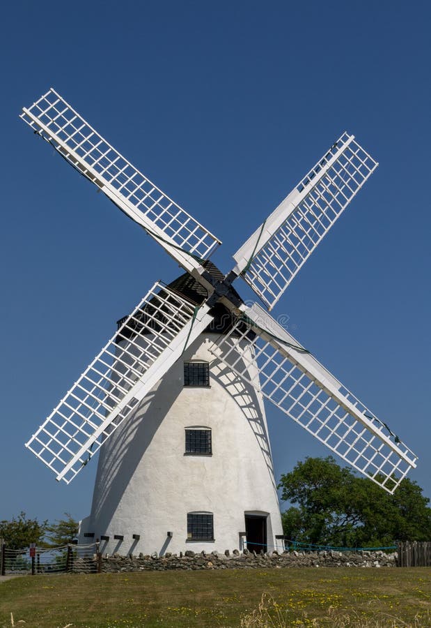 Windmill in Anglesey, Wales Stock Photo - Image of ploughed, building ...