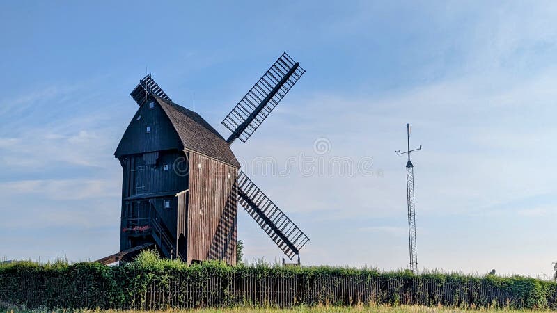 Windmill from the Back and Cloudy Blue Sky Stock Image - Image of farm ...