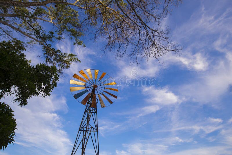 Windmill on Blue Sky Background with White Clouds in Sunny Day Stock ...