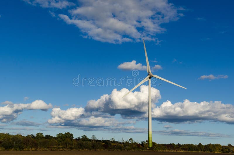 Windmill by a Blue Sky with White Clouds by Fall Season Stock Image ...