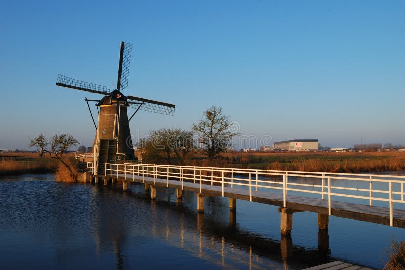 Windmill with bridge stock photo. Image of netherlands - 7693000
