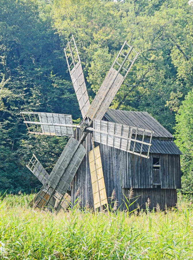Windmill Close Up, Green Forest, Wild Vegetation Stock Photo - Image of ...