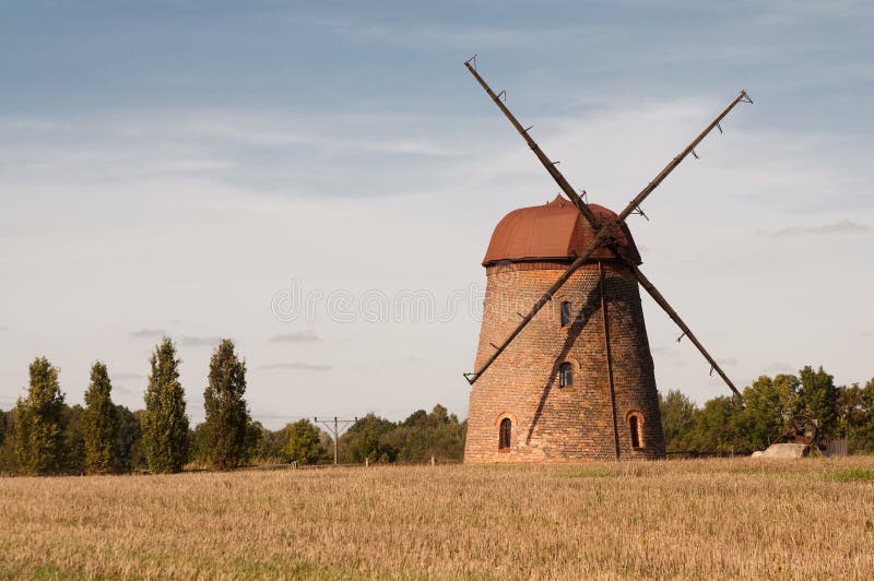 Windmill on farm field stock photo. Image of field, windmill - 16169304