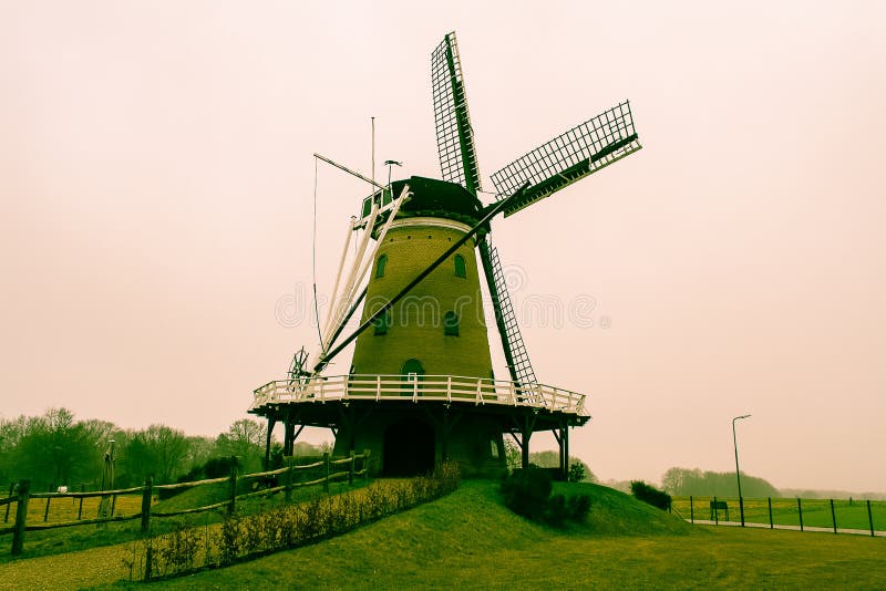 Windmill in the field stock image. Image of architecture - 73075933