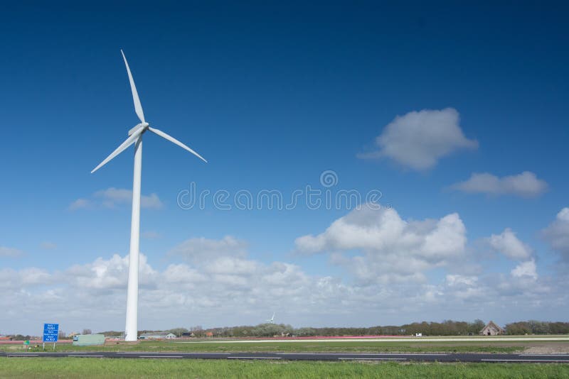 Windmill in the fields stock photo. Image of beautiful - 31152026