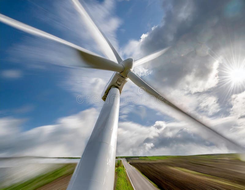Windmill Generating Electricity on a Sunny, Windy Day Stock ...