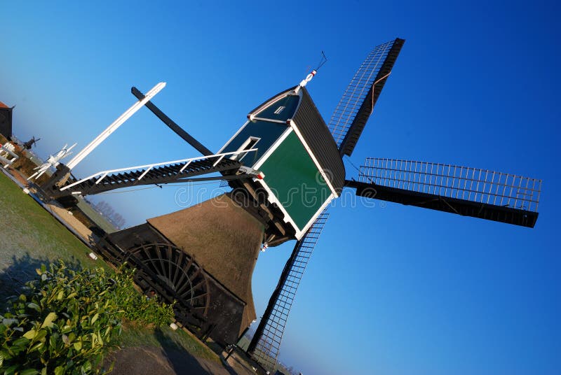 Windmill green stock image. Image of reflection, green - 7693167