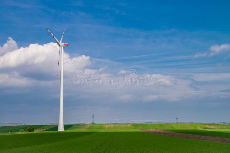 Windmill on a field stock image. Image of innovation - 98528053