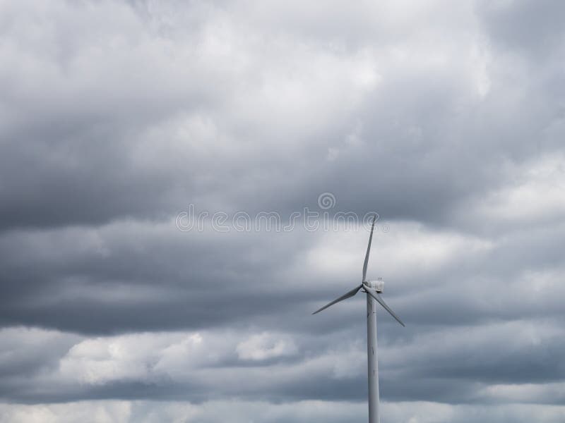 Windmill and Heavy Rain Clouds Stock Photo - Image of propeller ...
