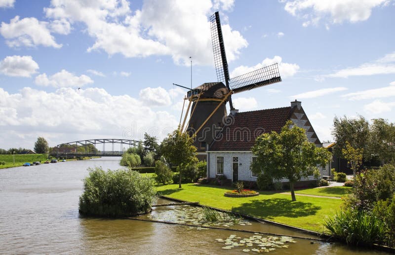 Windmill, House and Bridge at the Waterside Stock Image - Image of ...