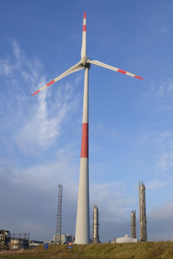 Windmill in Industrial Area Stock Image - Image of blue, white: 49755771