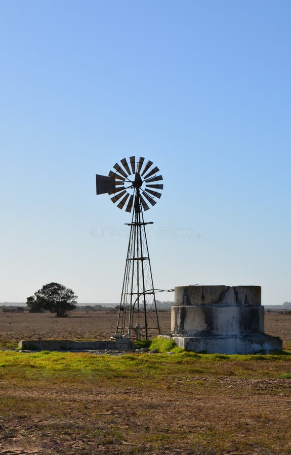 Windmill... stock image. Image of windmill, tank, morning - 51540869