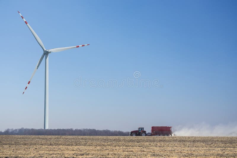 Windmill and the Liming on the Field Stock Photo - Image of spreading ...