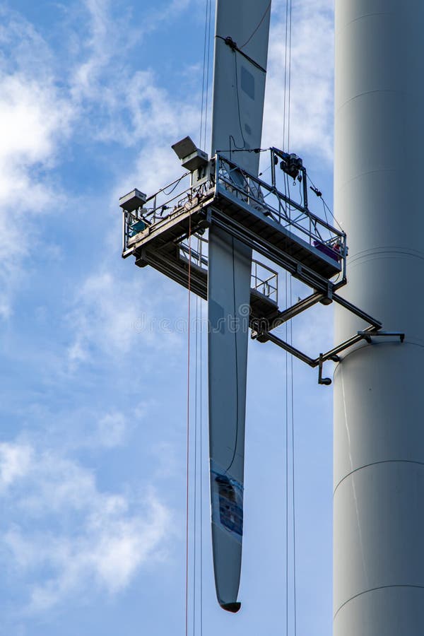 Windmill maintenance stock photo. Image of energy, hanging - 160652902
