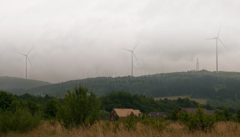 Windmill stock image. Image of mountain, rain, generate - 73592893
