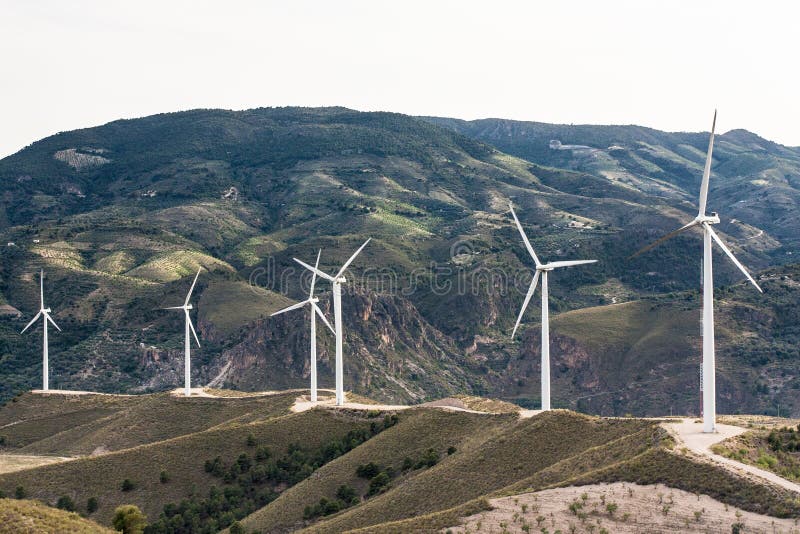 Windmill in the Mountains stock photo. Image of followme - 59641570
