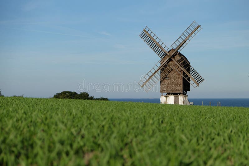 Windmill Near the Coast with View To the Sea Stock Photo - Image of ...