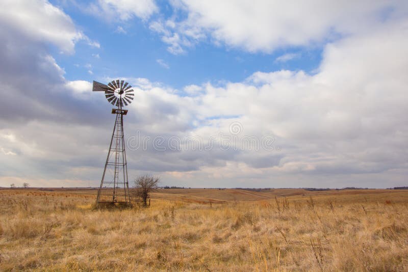 A Windmill in a Nebraska Pasture Stock Photo - Image of dormant ...