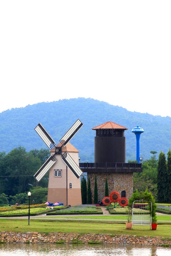 Windmill Netherlands Style in Flower Gar Stock Image - Image of orange ...