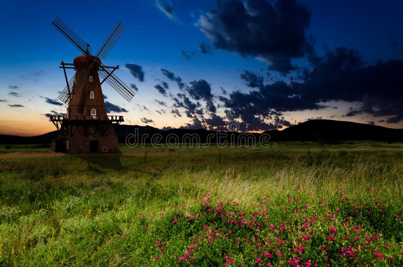 Windmill in the night stock image. Image of copyspace - 36973663