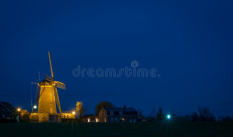 Windmill at night stock image. Image of wind, typical - 63415867