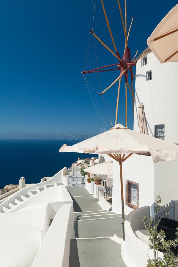 Windmill in Oia Santorini stock image. Image of traditional - 38099205