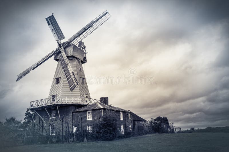 Windmill stock image. Image of fence, artwork, field - 41164063