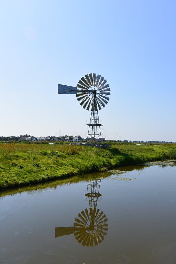 Windmill in Polder stock image. Image of windmill, conservation - 65854467