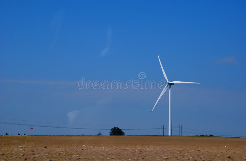 Windmill and power-line stock image. Image of blue, turbine - 33800305