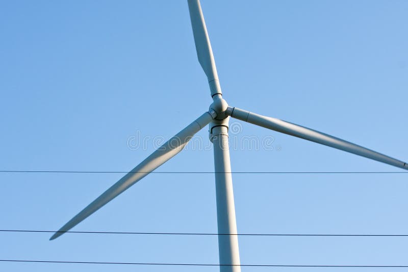 Windmill and powerlines stock image. Image of blue, network - 11370287