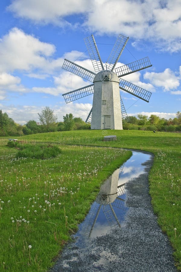 Windmill Reflection stock image. Image of spring, puddle - 12829371