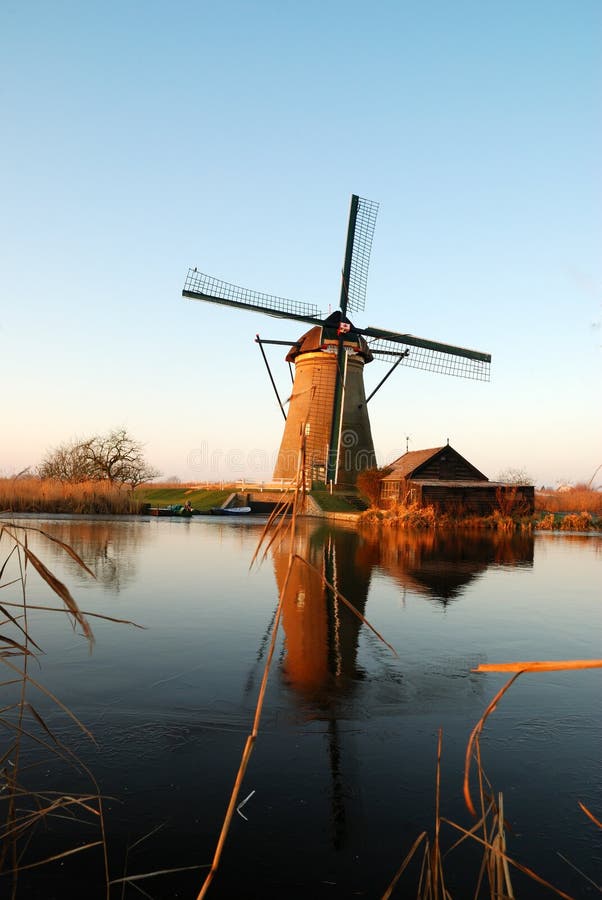 Windmill with reflection stock image. Image of kinderdijk - 7692965