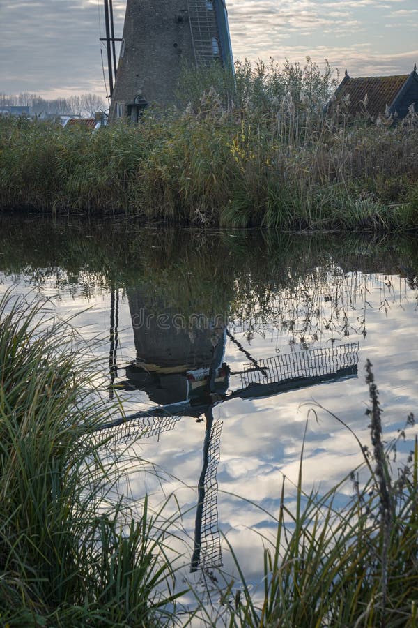 Windmill Reflection on Water Stock Image - Image of landmark ...