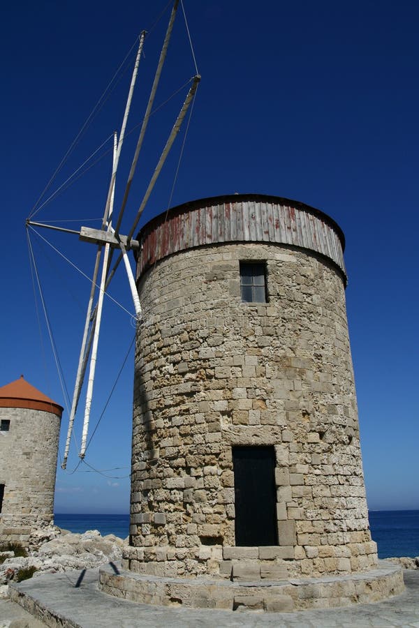 Windmill at Rhodes stock photo. Image of vintage, touristic - 44354170
